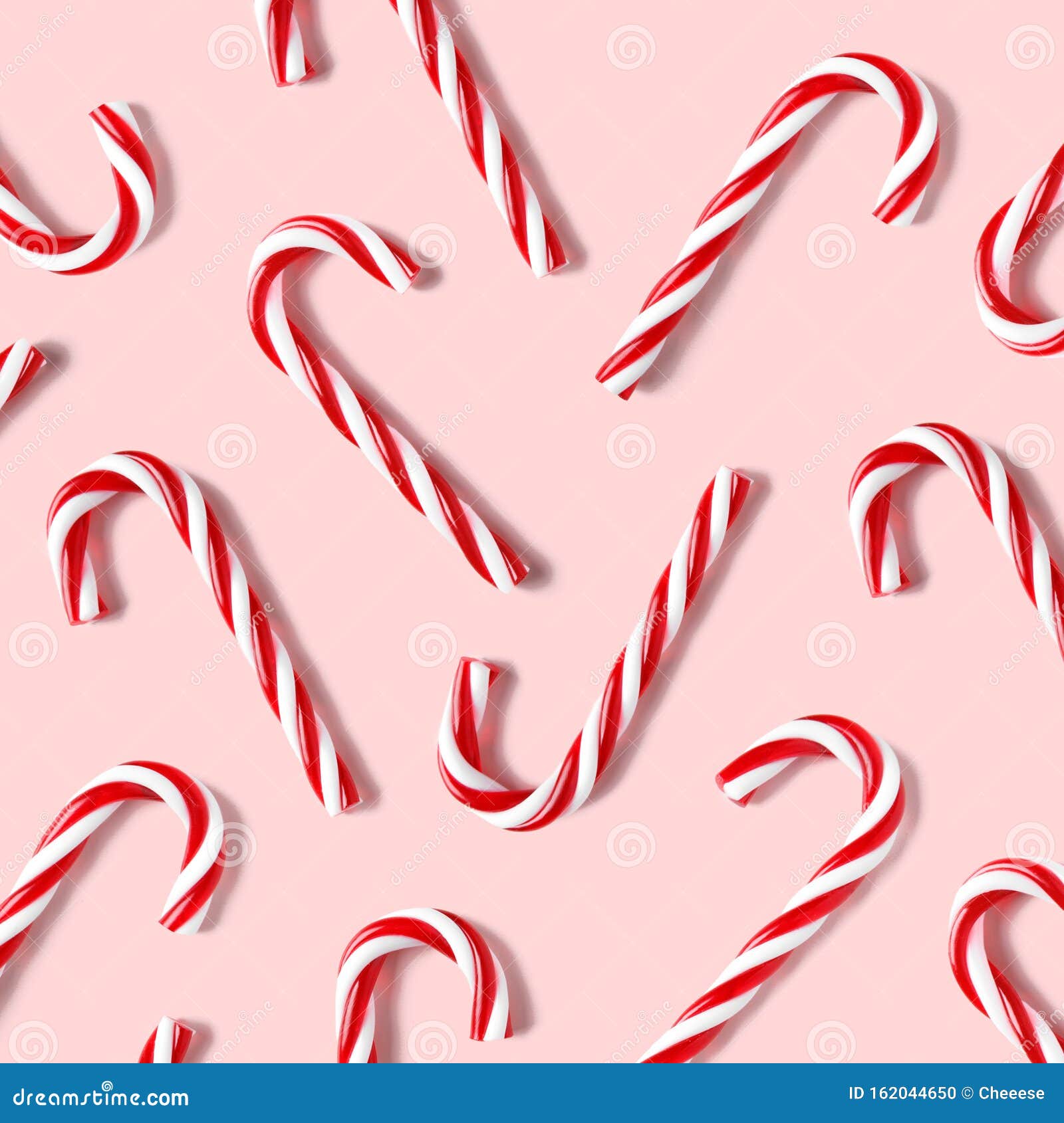 Flat Lay Composition with Candy Canes on Pink Background Stock Photo ...