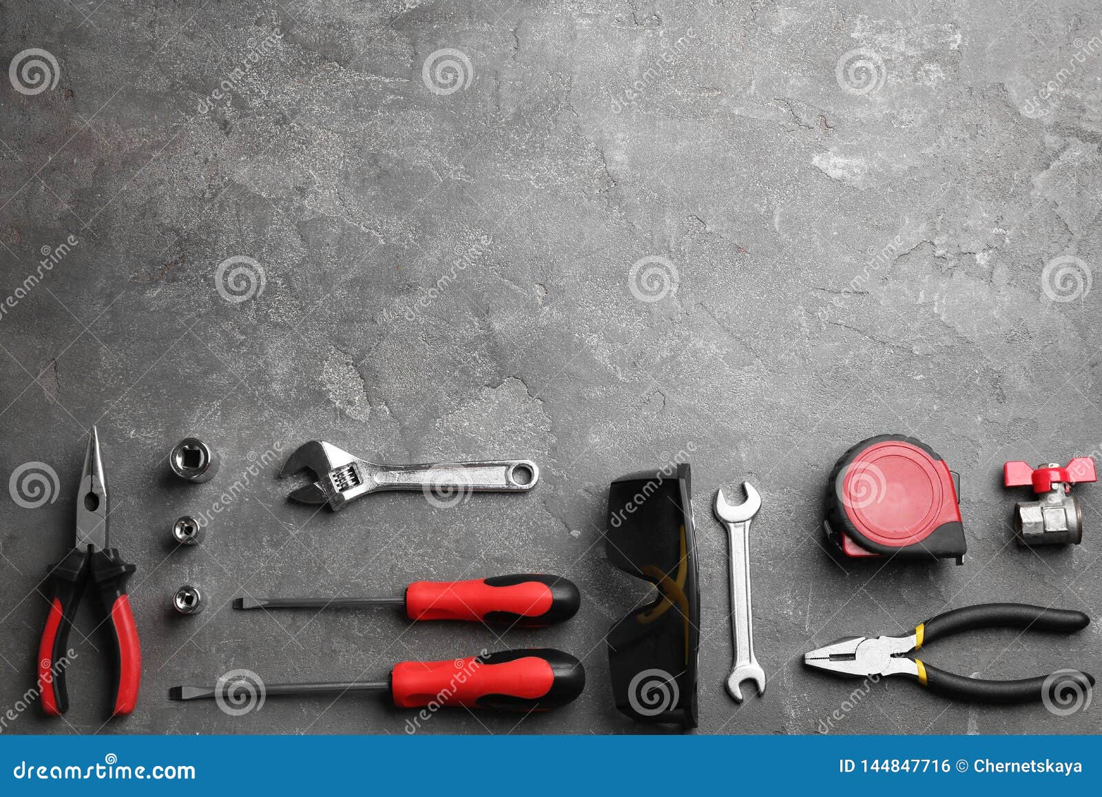 Flat Lay Composition with Construction Tools on Grey, Space for Text ...