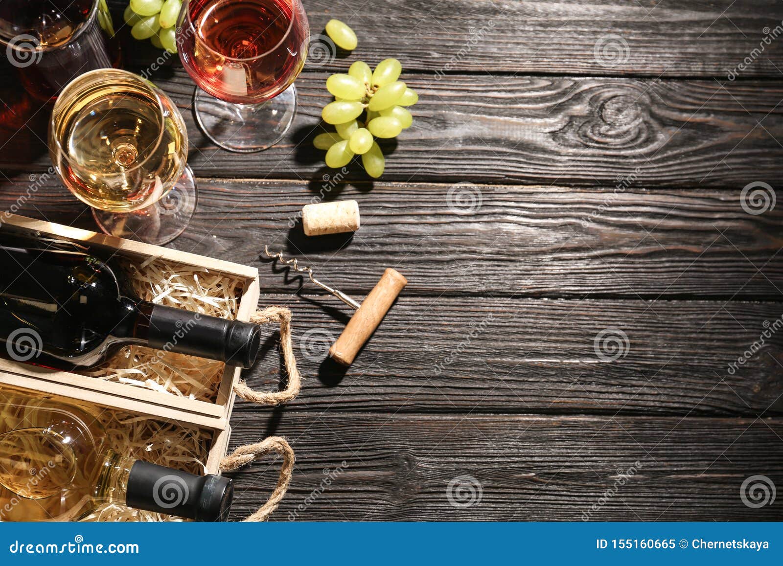 Flat Lay Composition with Crates and Bottles of Wine on Wooden Table ...