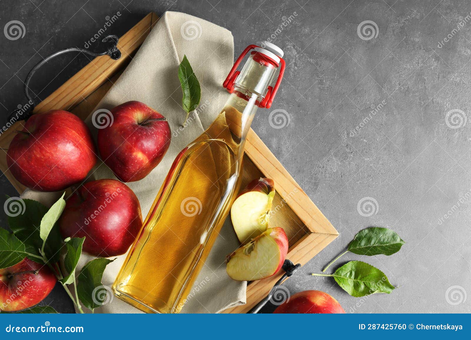 Flat Lay Composition with Delicious Apple Cider on Gray Table, Space ...