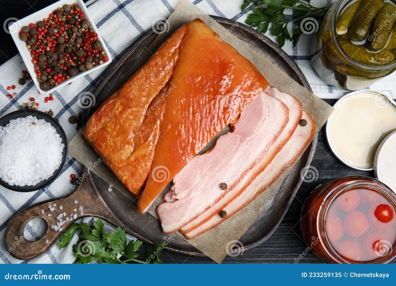 Flat Lay Composition with Delicious Smoked Bacon on Black Wooden Table ...