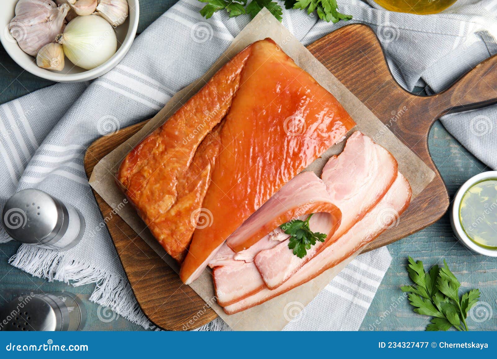 Flat Lay Composition with Delicious Smoked Bacon on Light Blue Wooden ...