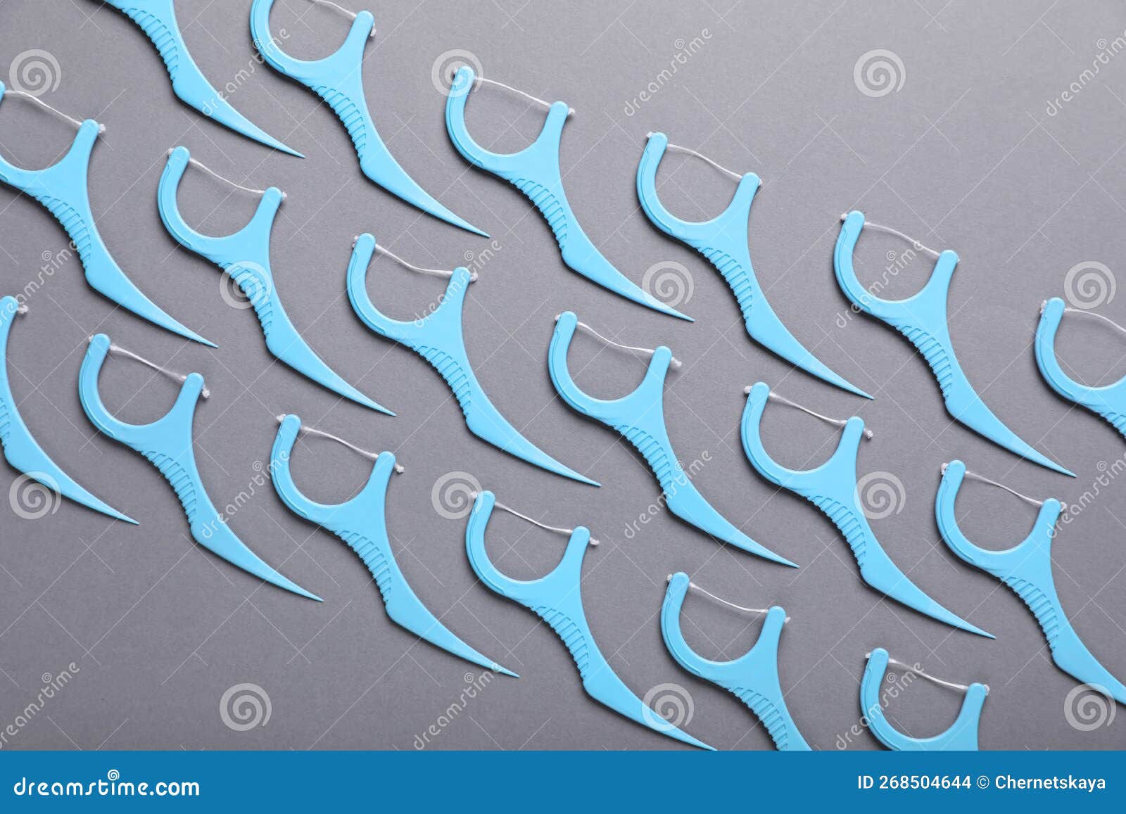 Flat Lay Composition with Dental Floss Picks on Grey Background Stock ...