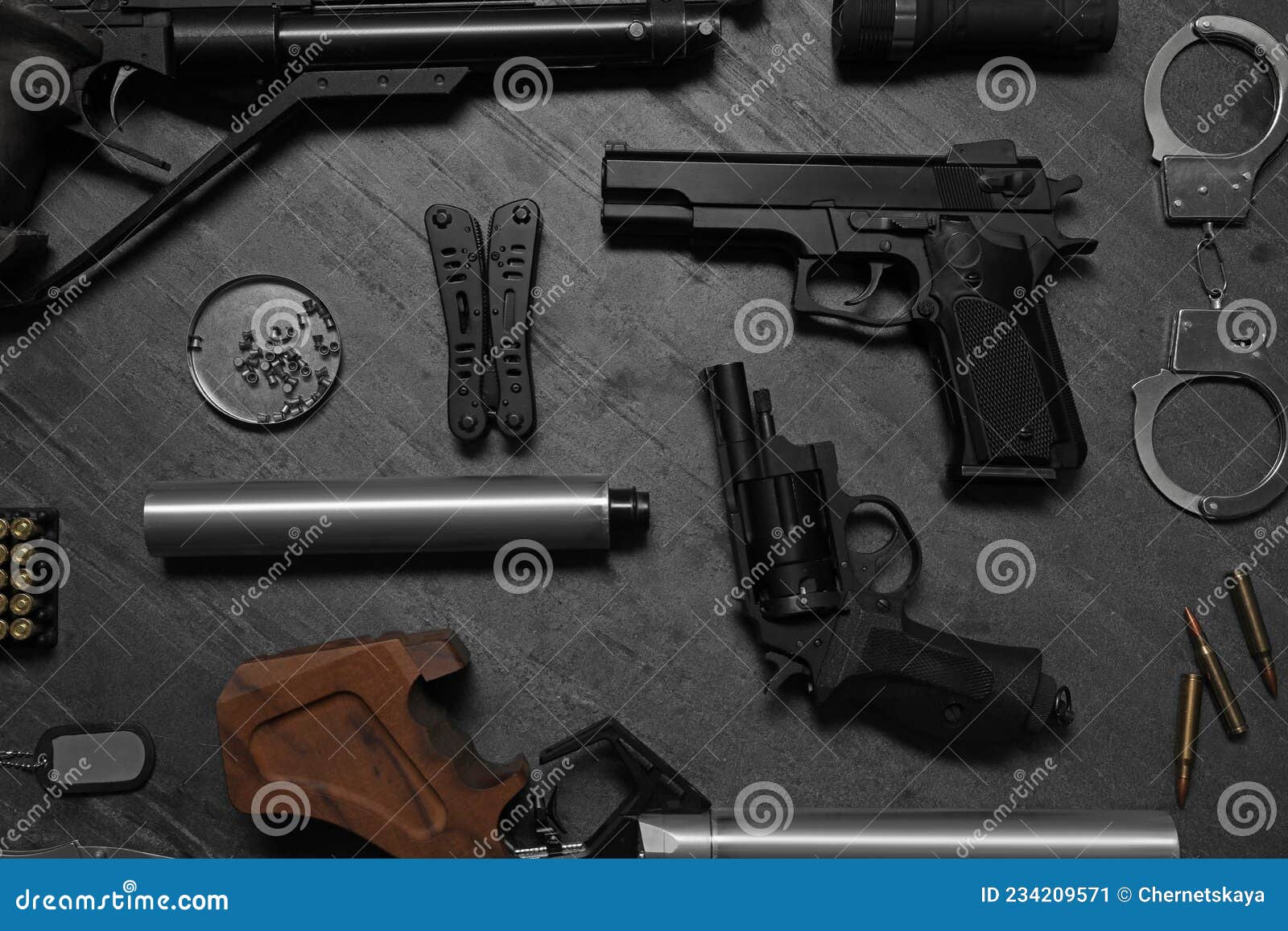 Flat Lay Composition with Different Guns on Dark Table Stock Image ...
