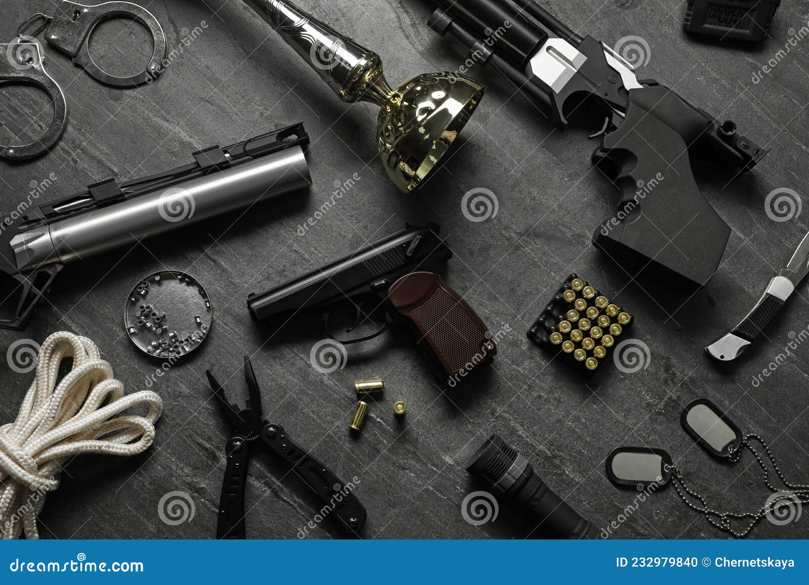 Flat Lay Composition with Different Guns on Dark Table Stock Photo ...
