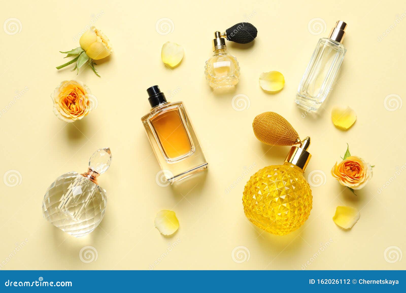 Flat Lay Composition with Different Perfume Bottles Stock Photo - Image ...