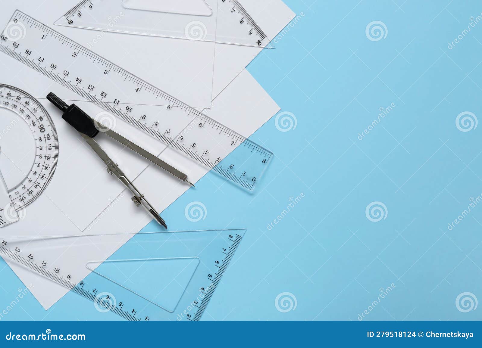 Flat Lay Composition with Different Rulers and Compass on Light Blue ...