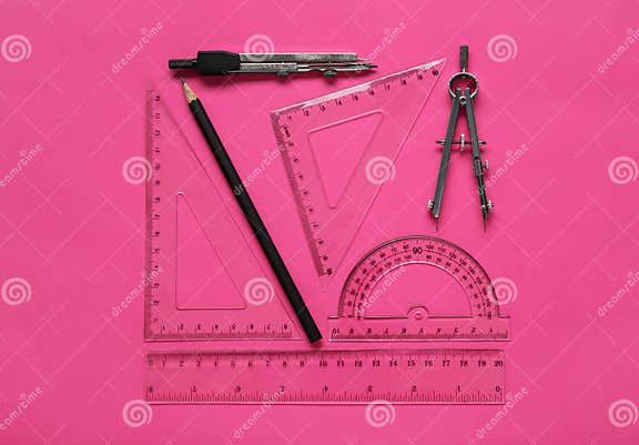 Flat Lay Composition with Different Rulers and Compass on Pink ...