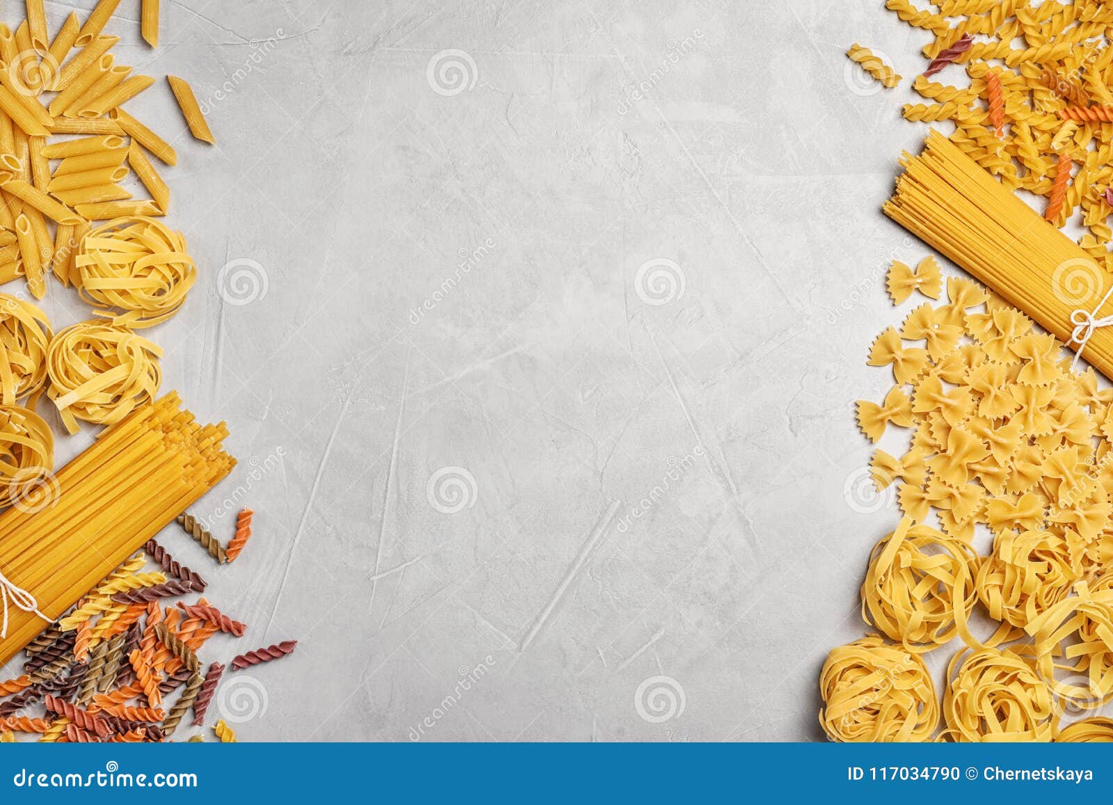 Flat Lay With Uncooked Pasta On Blue Background Stock Photography ...