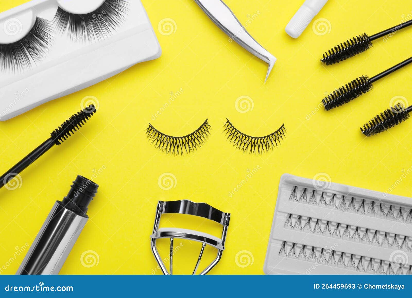 Flat Lay Composition with Fake Eyelashes, Brushes and Tools on Yellow ...