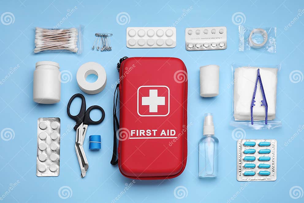 Flat Lay Composition with First Aid Kit on Light Blue Background Stock ...