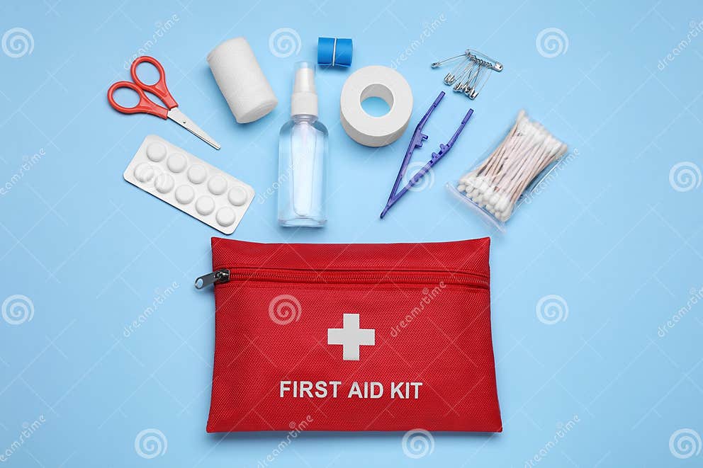 Flat Lay Composition with First Aid Kit on Light Blue Background Stock ...