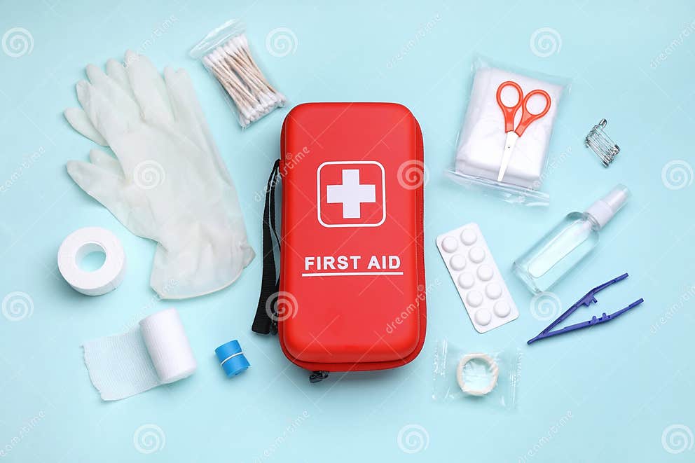 Flat Lay Composition with First Aid Kit on Light Blue Background Stock ...