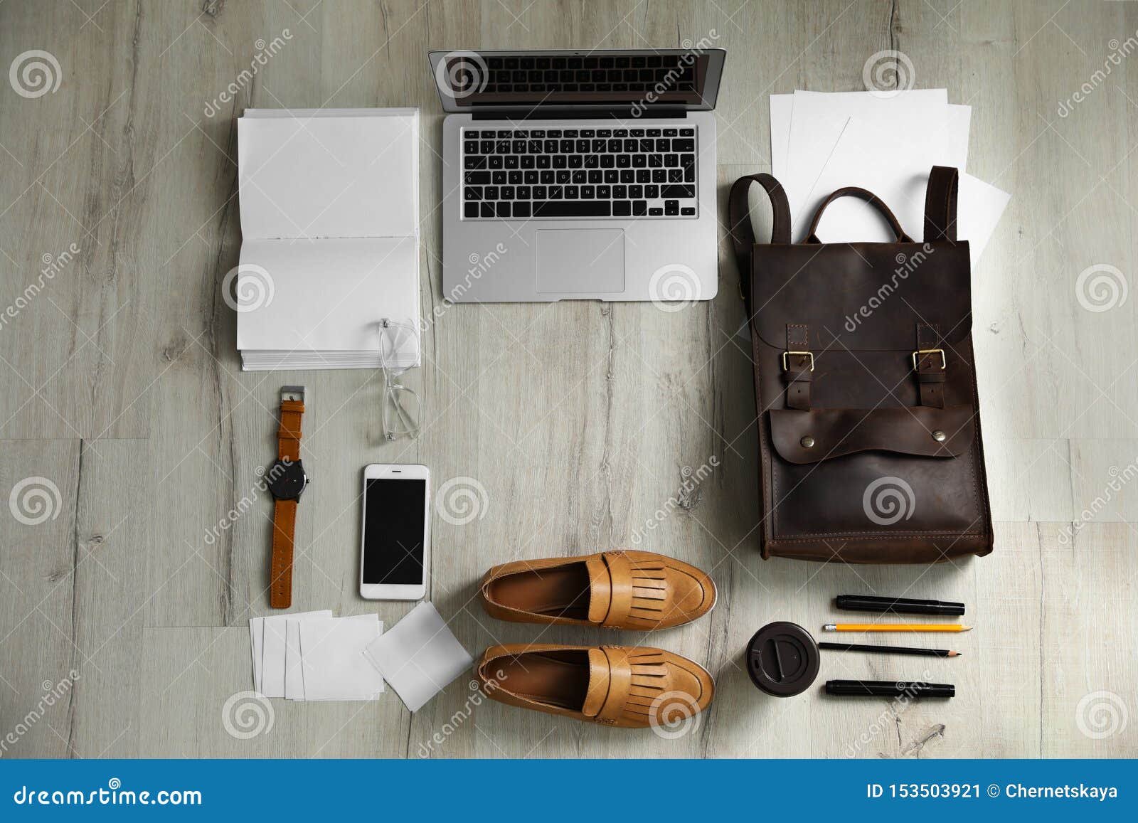 Flat Lay Composition with Laptop and Open Notebook on Wooden Floor ...