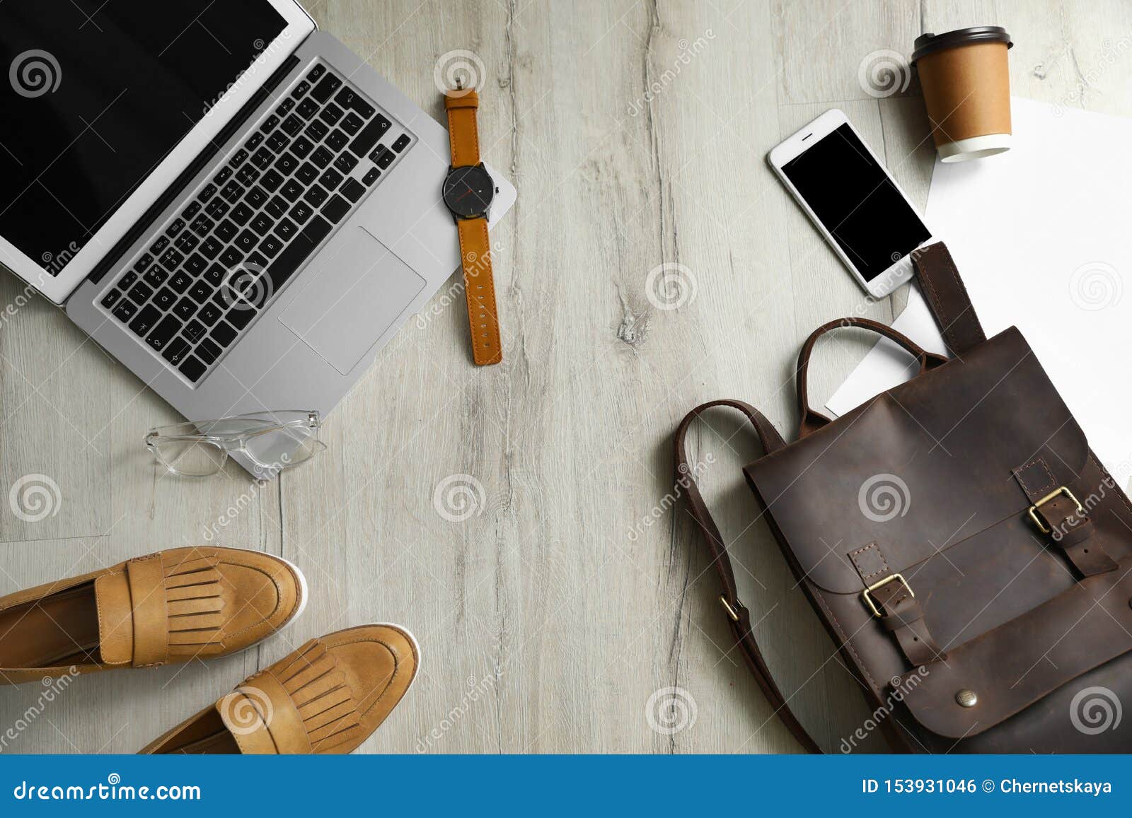 Flat Lay Composition with Laptop and Open Notebook on Wooden Floor ...