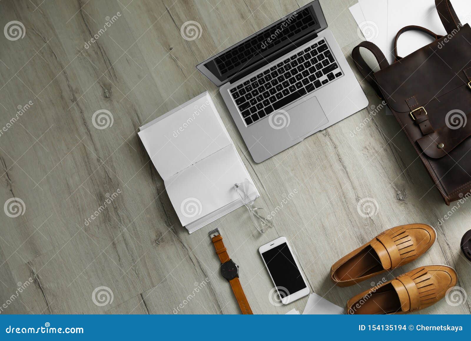 Flat Lay Composition with Laptop and Open Notebook on Wooden Floor ...