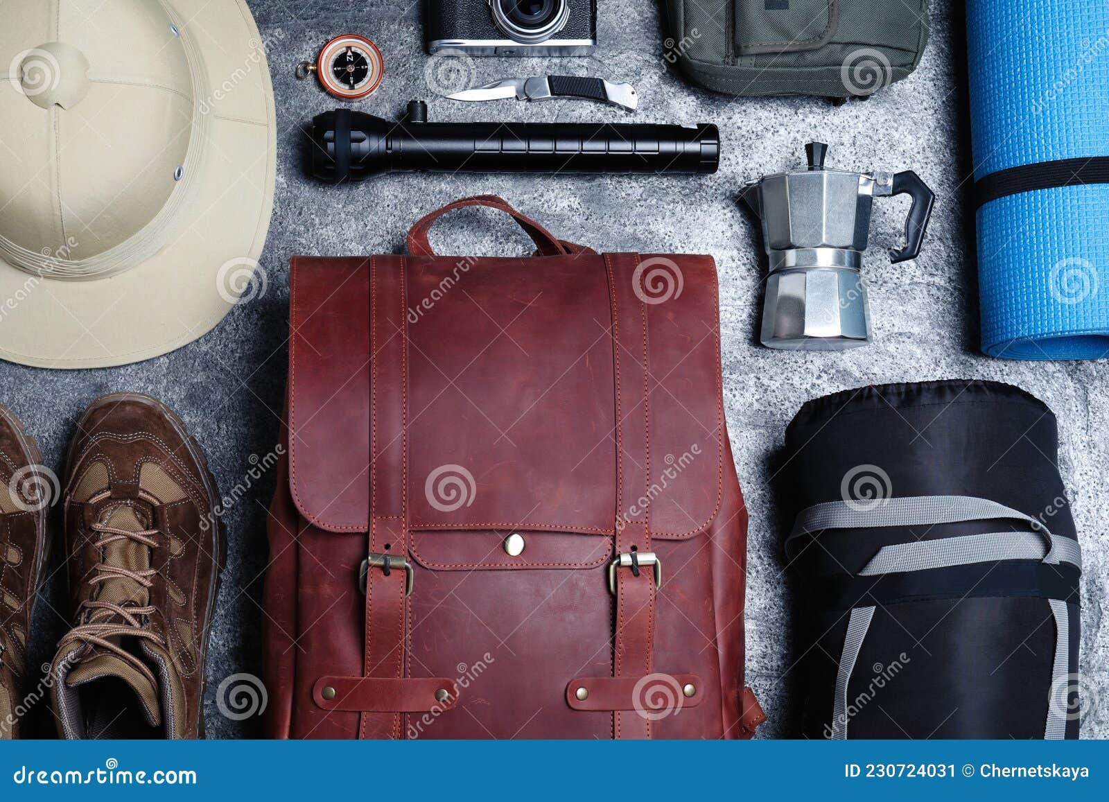 Flat Lay Composition with Leather Backpack and Camping Equipment for ...
