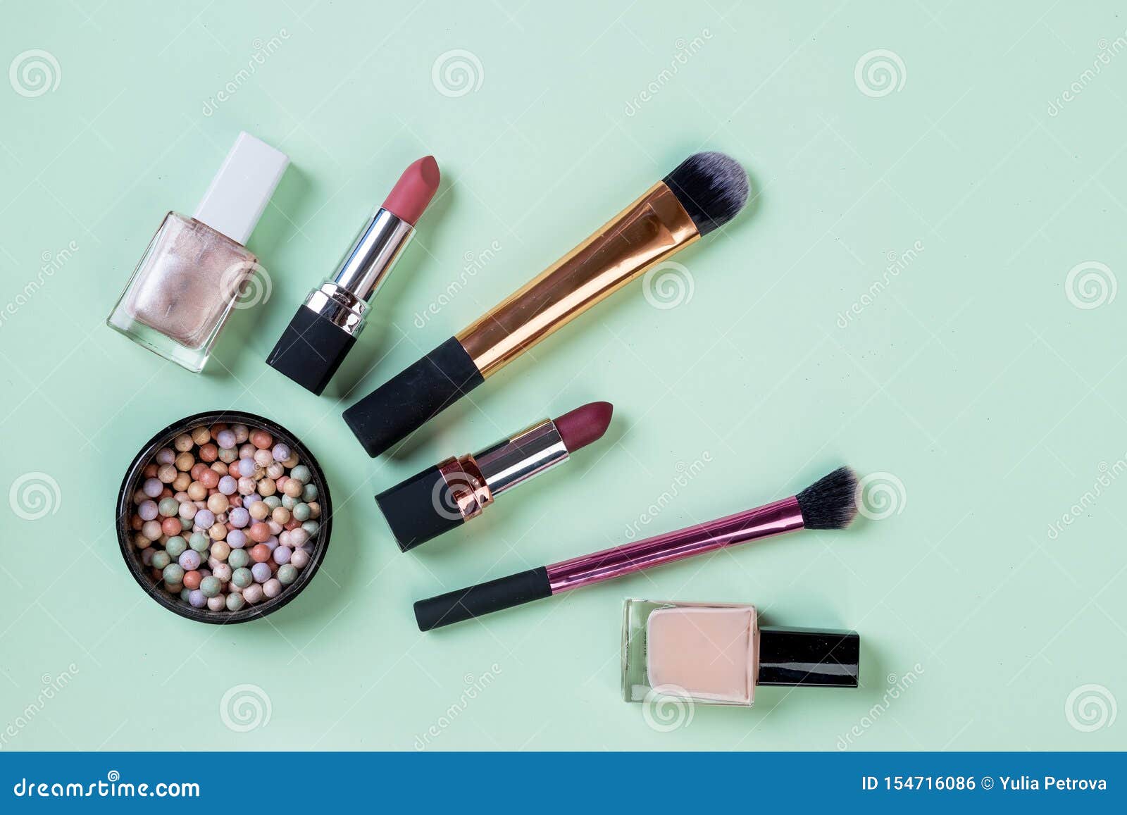 Flat Lay Composition with Makeup Products on Light Green Background.set ...