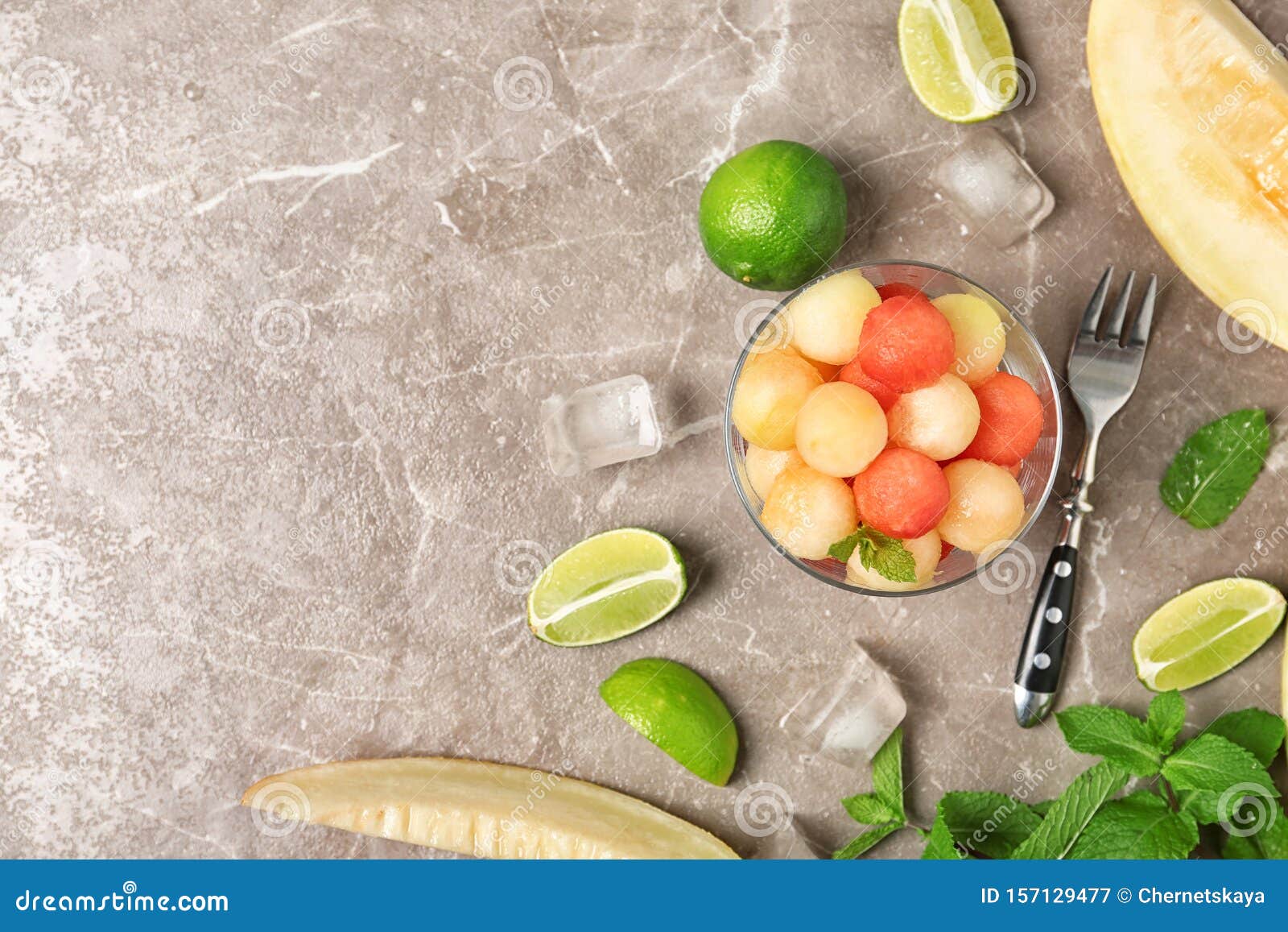 Flat Lay Composition with Melon and Watermelon Balls on Brown Marble ...