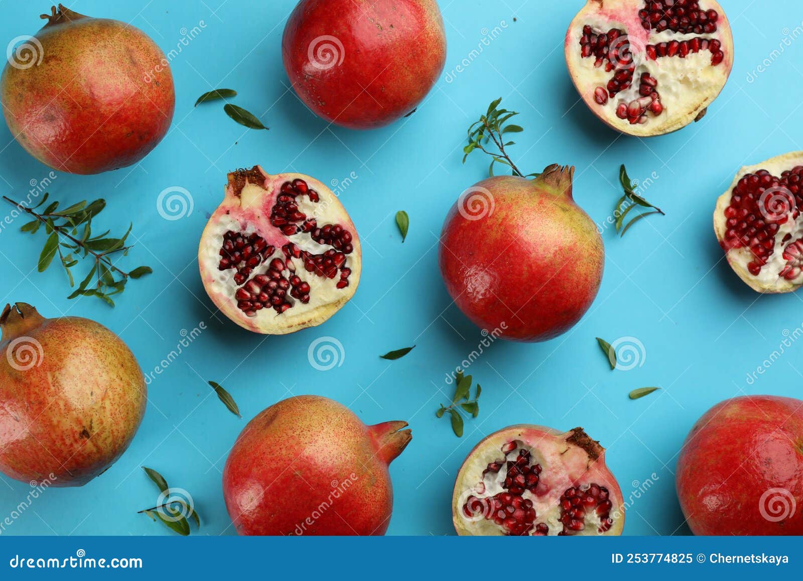 Flat Lay Composition with Ripe Pomegranates on Light Blue Background ...