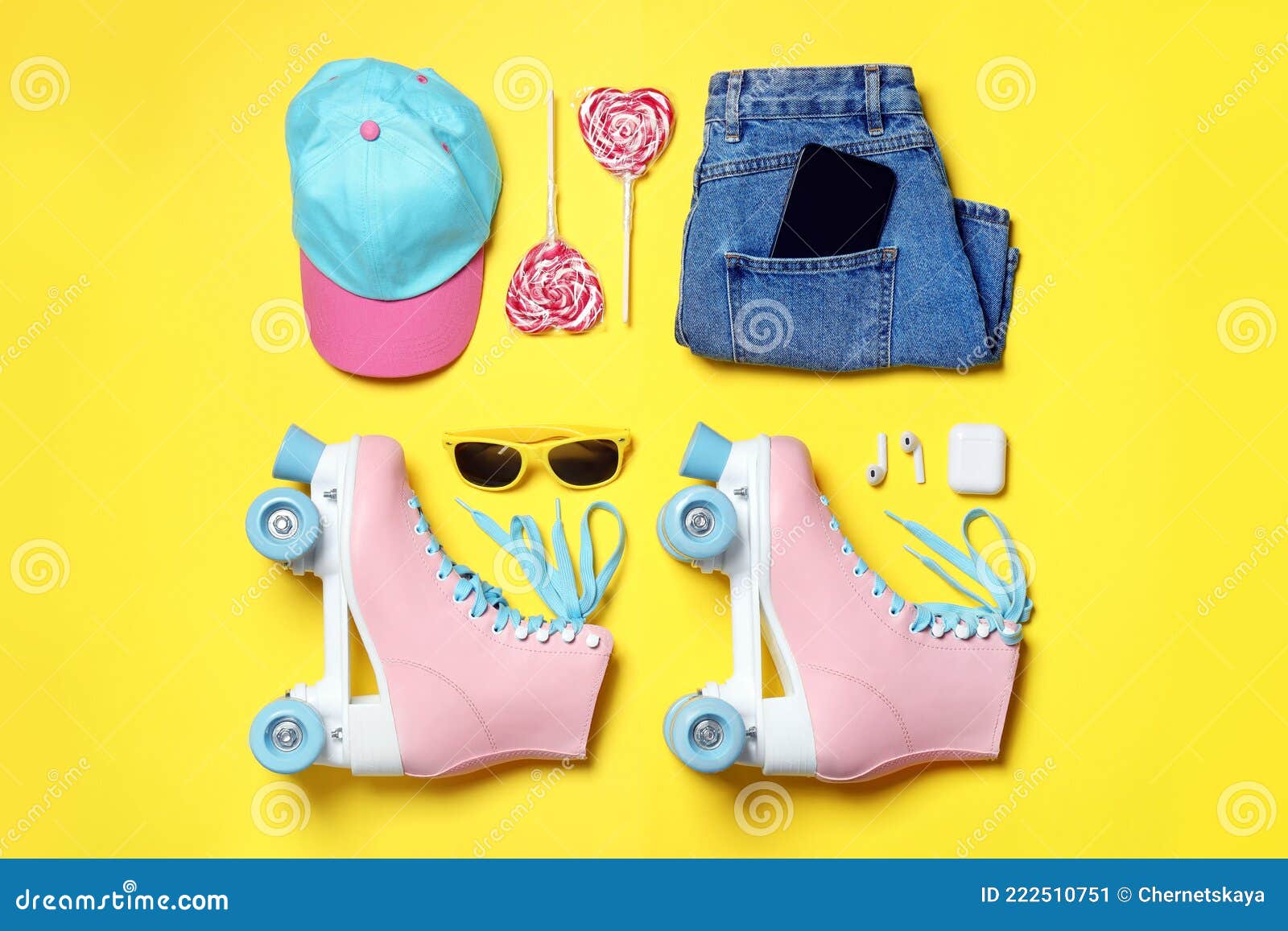 Flat Lay Composition with Roller Skates and Clothes on Yellow ...