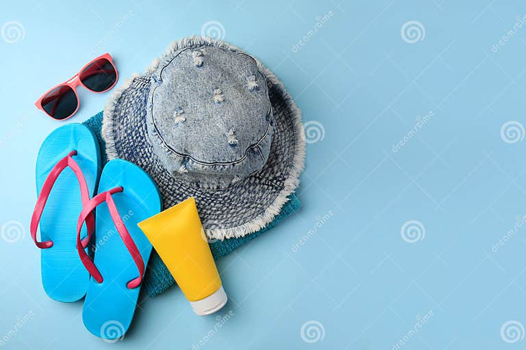 Flat Lay Composition with Sunscreen and Different Beach Accessories on ...