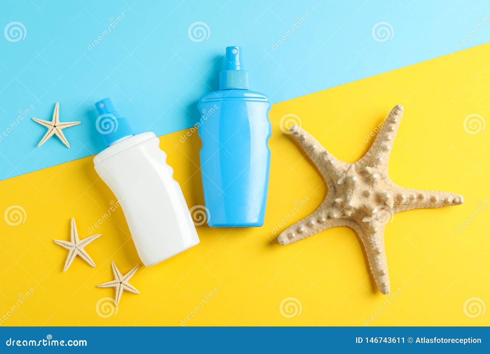 Flat Lay Composition with Sunscreen Sprays and Starfishes on Two Tone ...