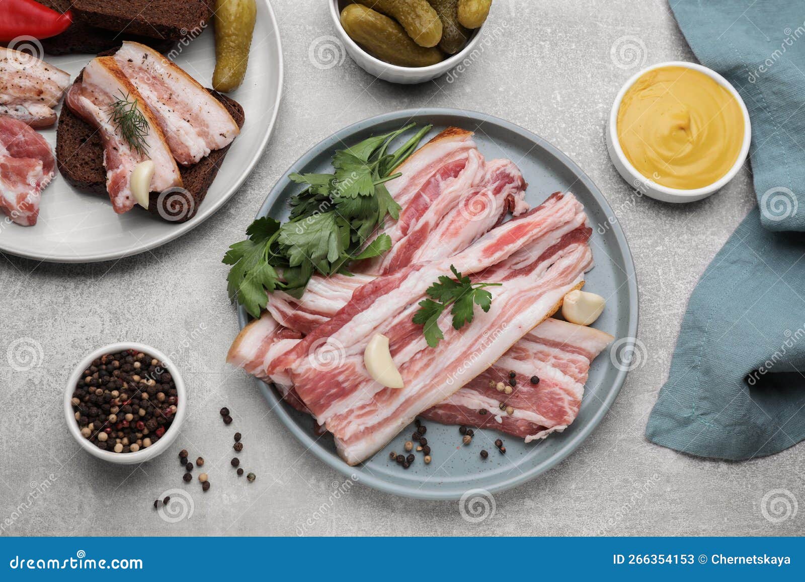 Flat Lay Composition of Tasty Pork Fatback and Spices on Grey Table ...