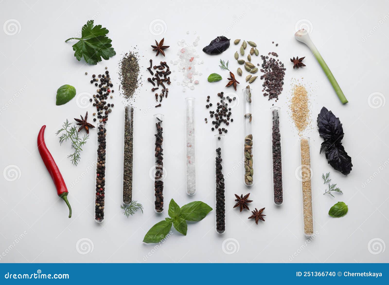 Flat Lay Composition with Various Spices, Test Tubes and Fresh Herbs on ...