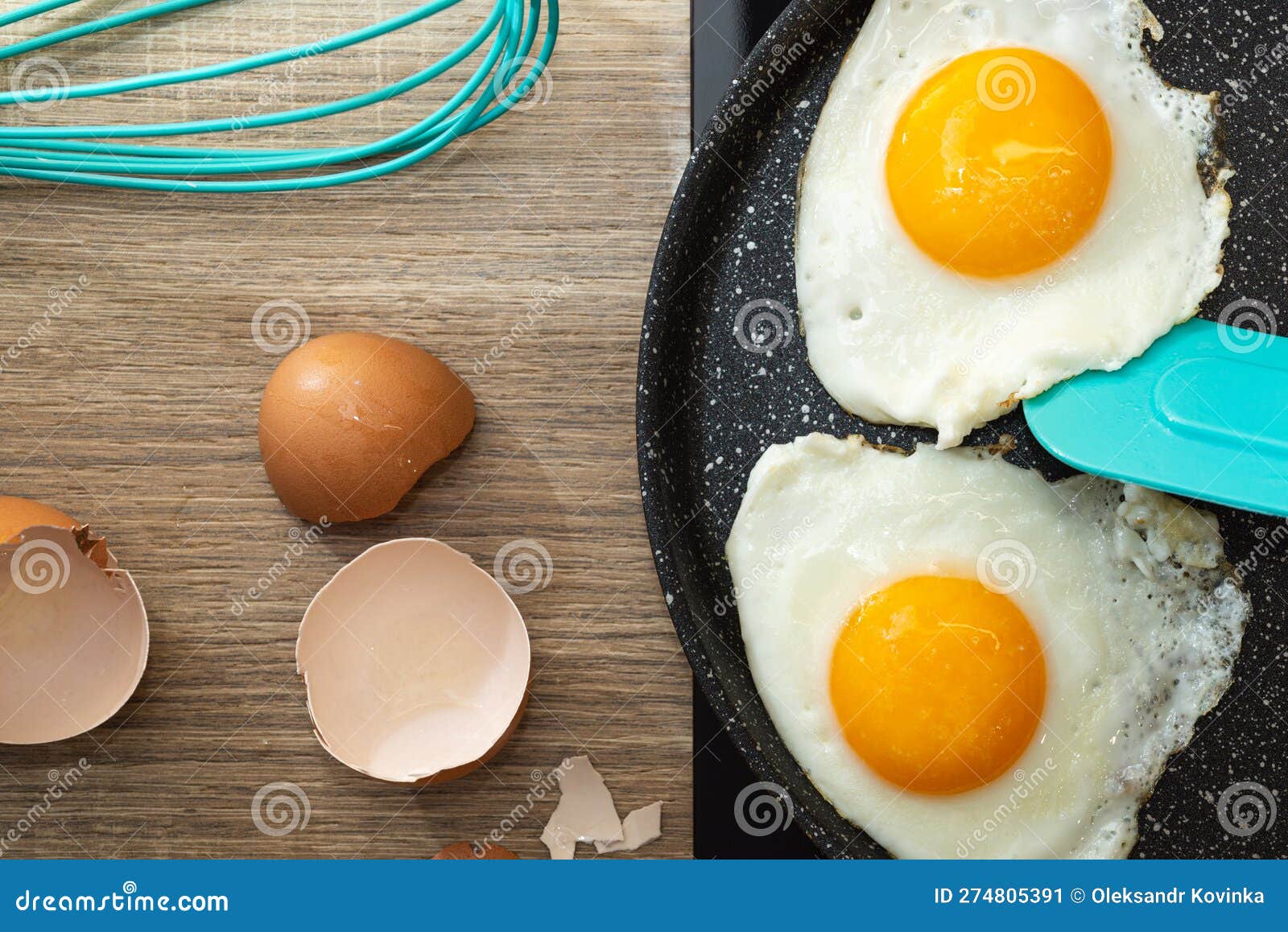 Flat Lay of Fried Eggs in Frying Pan, Spatula and Eggshell Stock Image ...