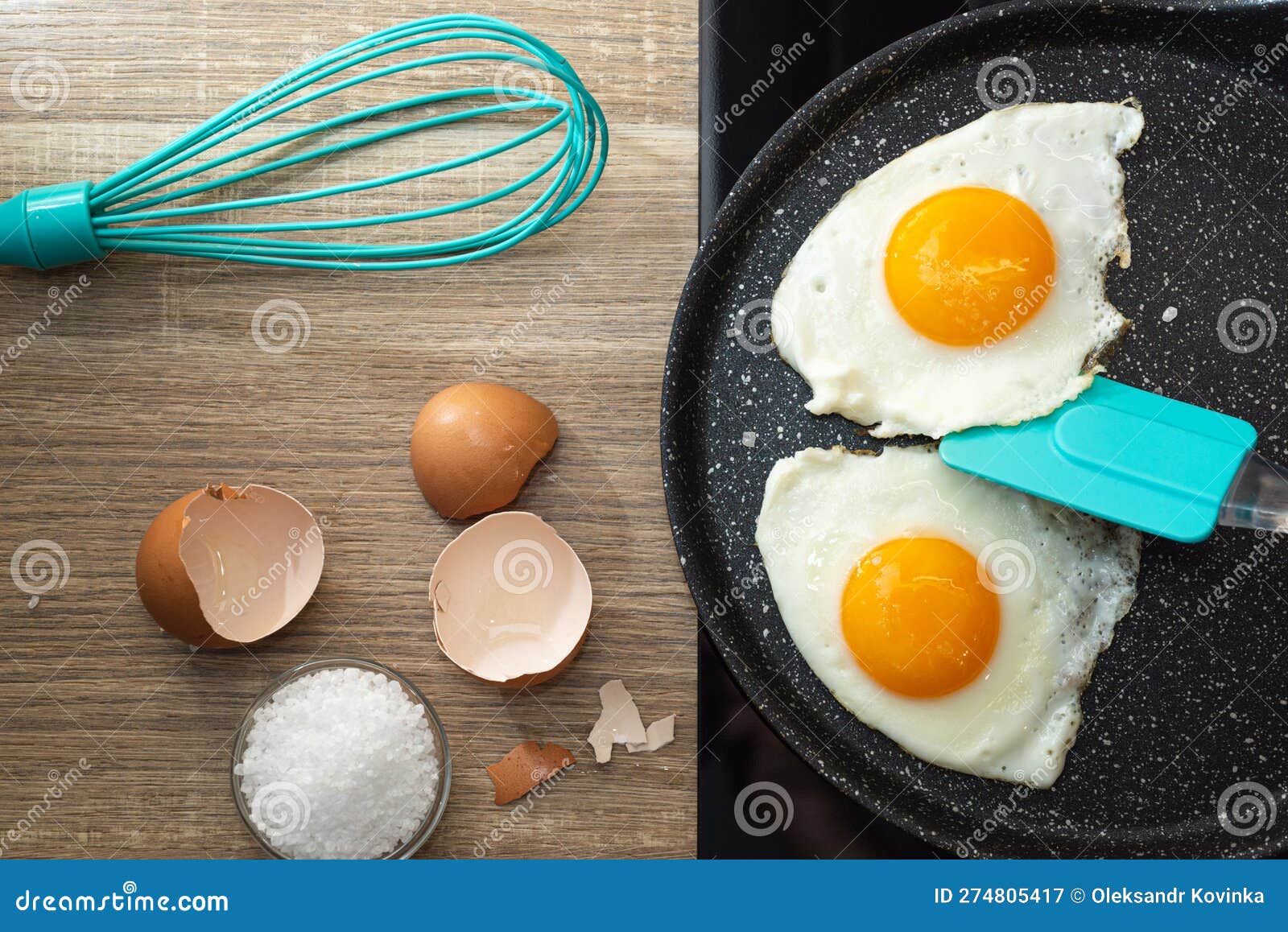 Flat Lay of Fried Eggs with Spatula in a Frying Pan, Salt and Eggshell ...