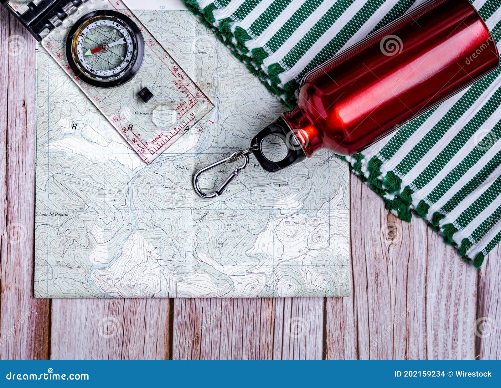 Flat Lay of Hiking Equipment - Map, Bottle, and Compass Stock Photo ...