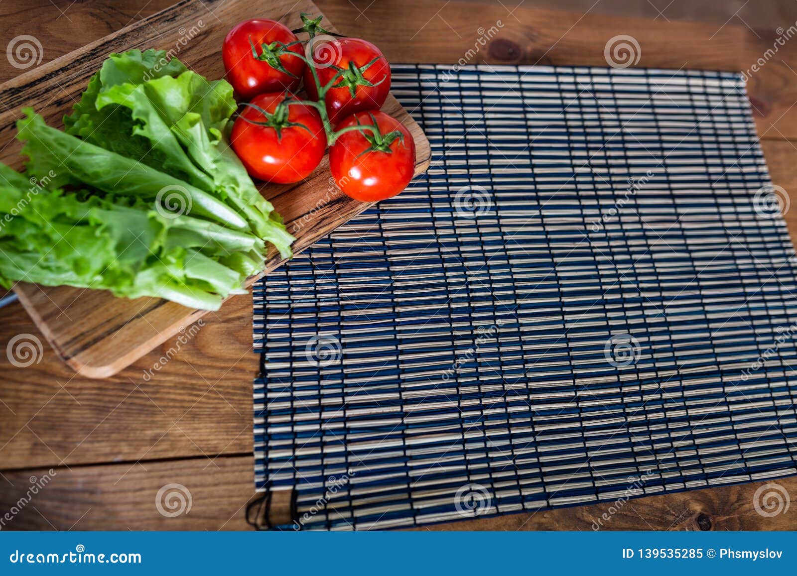 Flat Lay. Kitchen Table with Lettuce and Red Tomatoes Stock Image ...