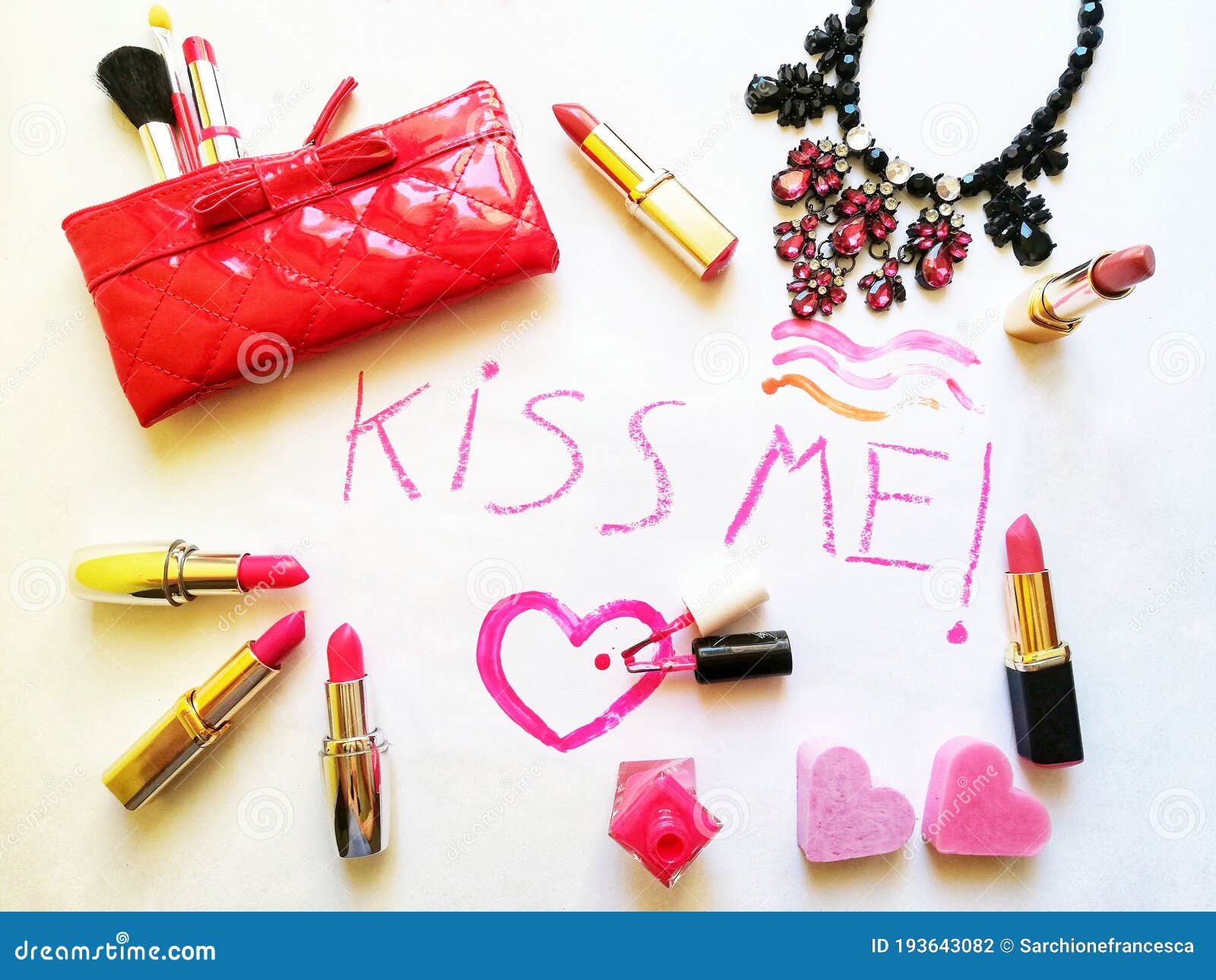 Flat Lay with Make Up and Kiss Me Writing Stock Photo - Image of nail ...