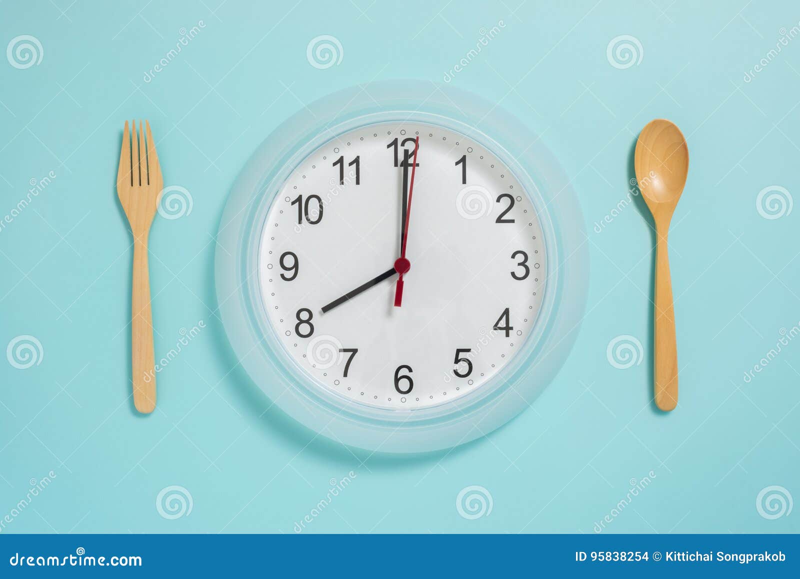 Flat Lay of Meal Time, Wall Clock Spoon and Fork on Pastel Blue Stock ...