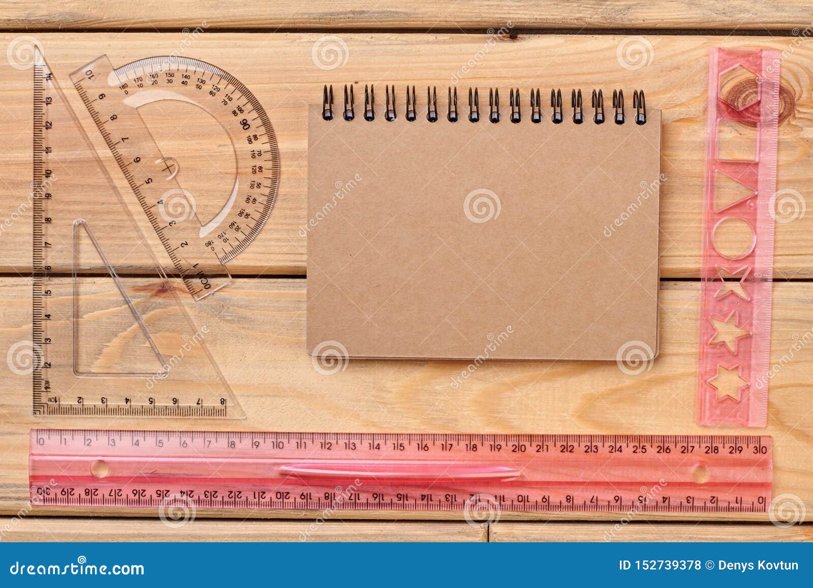 Flat Lay of Plastic Rulers and Spiral Notebook. Stock Photo - Image of ...