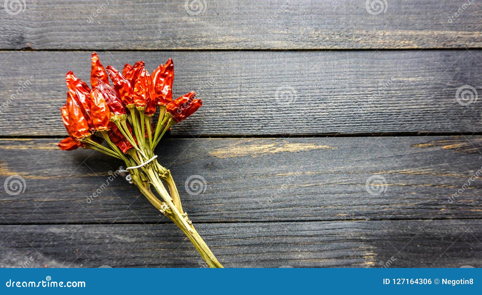 Dried chilli on table stock photo. Image of condiment - 127164306