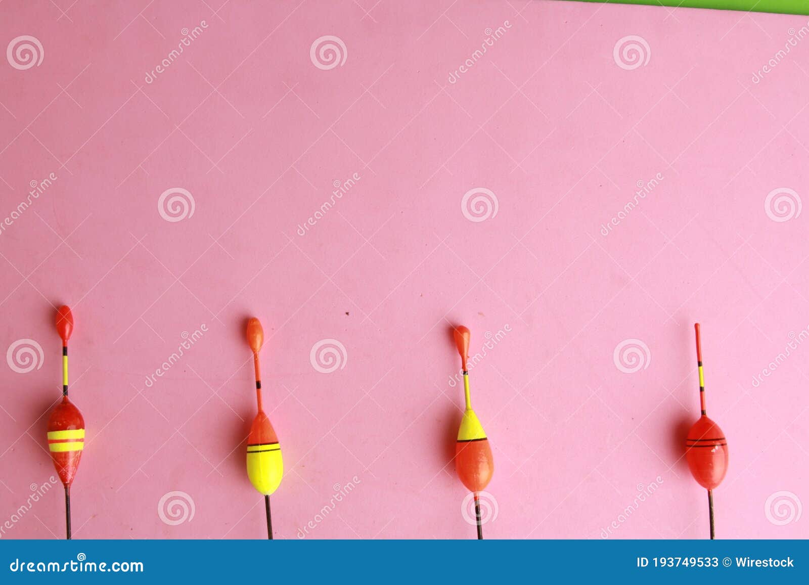 Flat Lay Shot of Fishing Floats on a Pink Surface Stock Image - Image ...