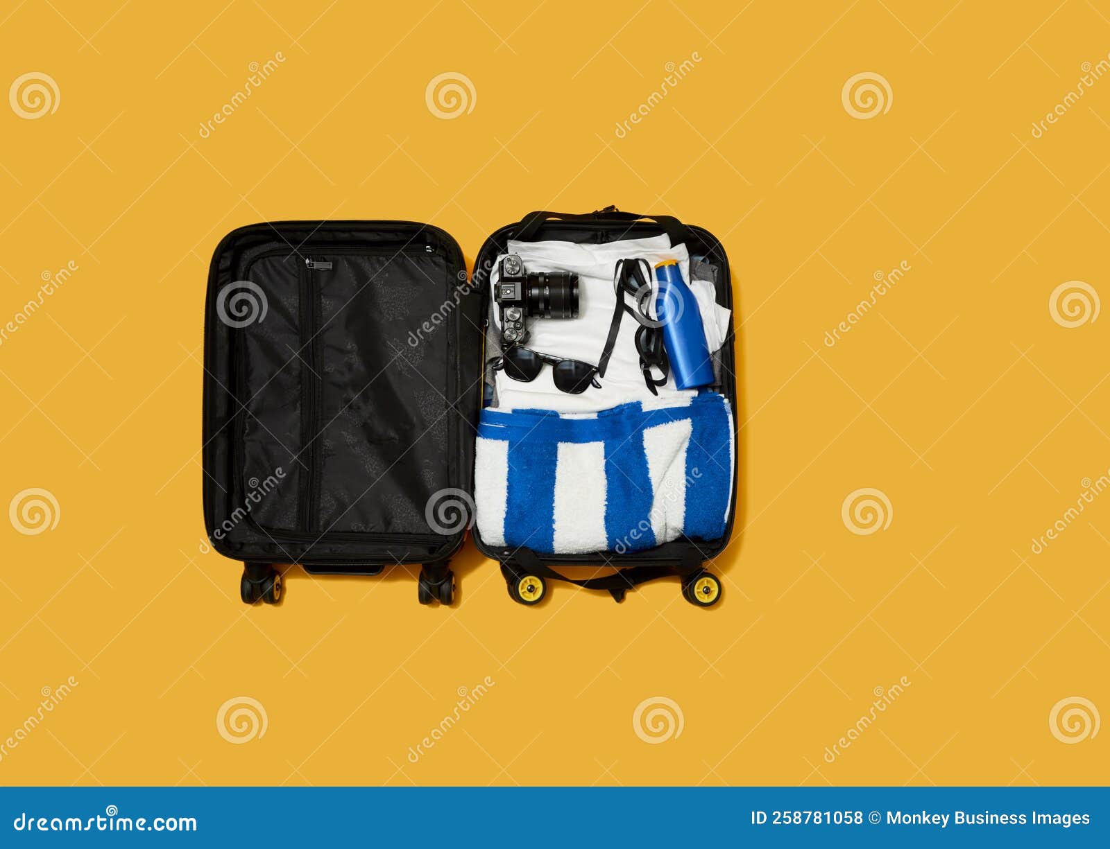 Flat Lay Shot of Open Suitcase Packed with Holiday Accessories on ...