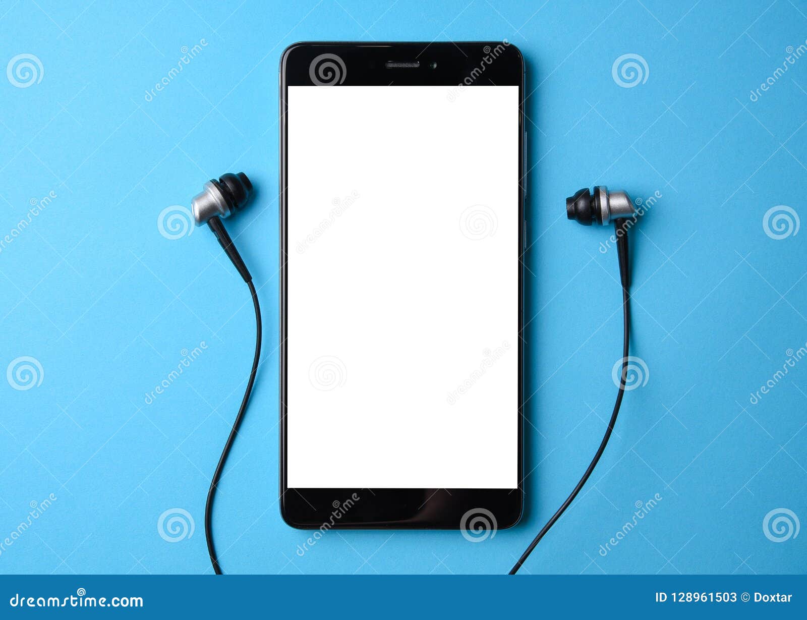Flat Lay Smartphone, Tablet Phone with Headphones on a Blue Back Stock ...