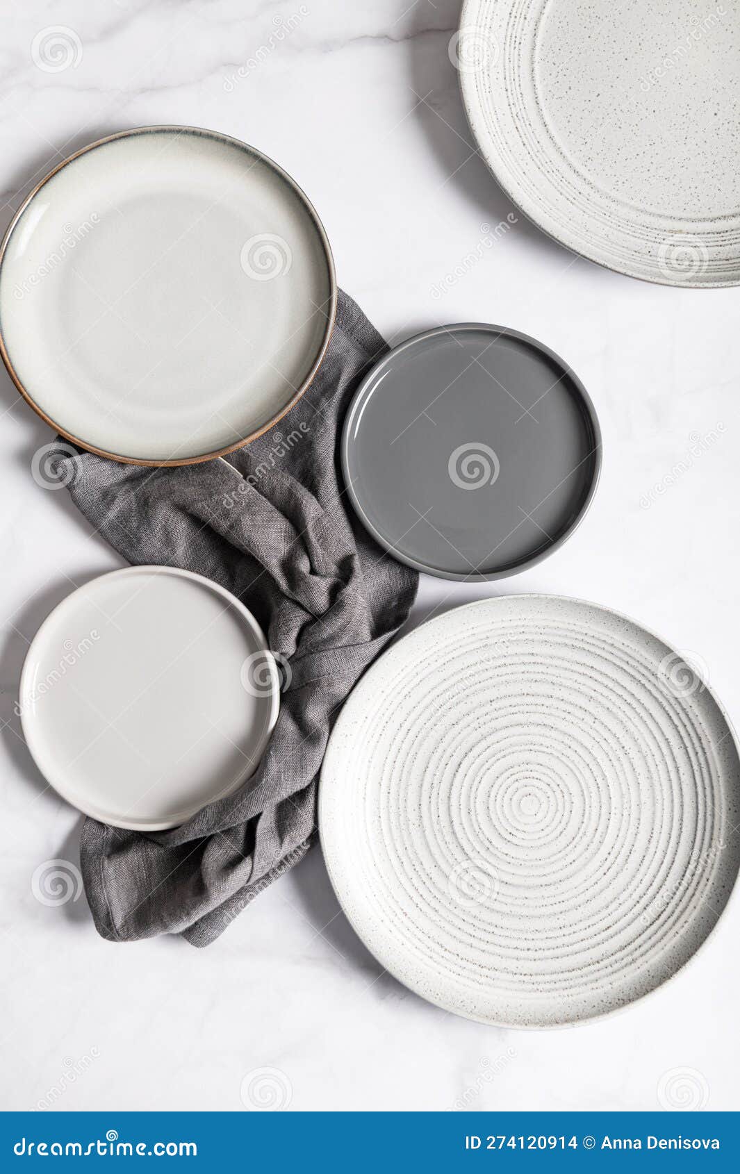 Trendy grey ceramic plates stock photo. Image of dish - 274120914