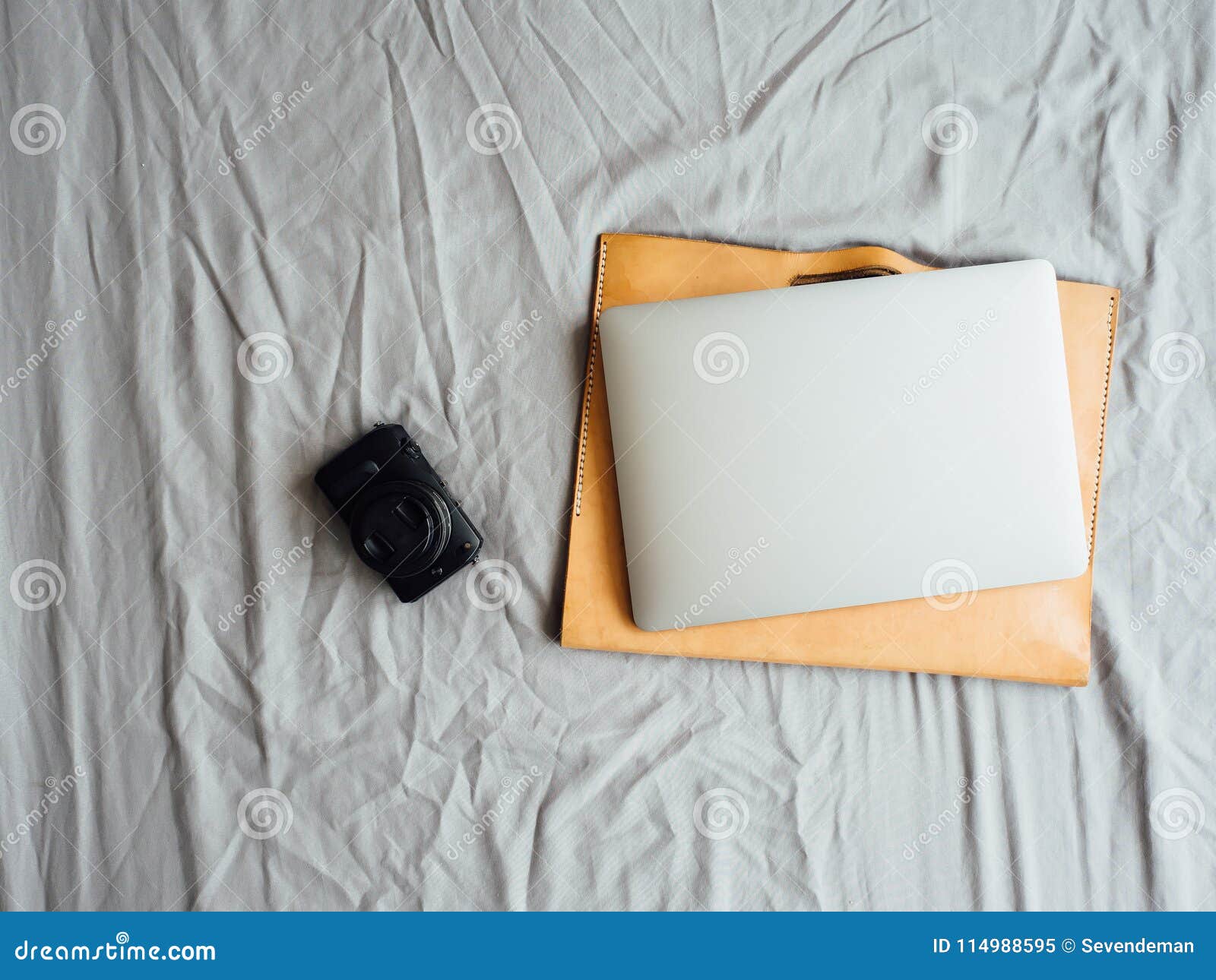 Flat Lay and Top View of Laptop and Camera on the Bed. Stock Image ...