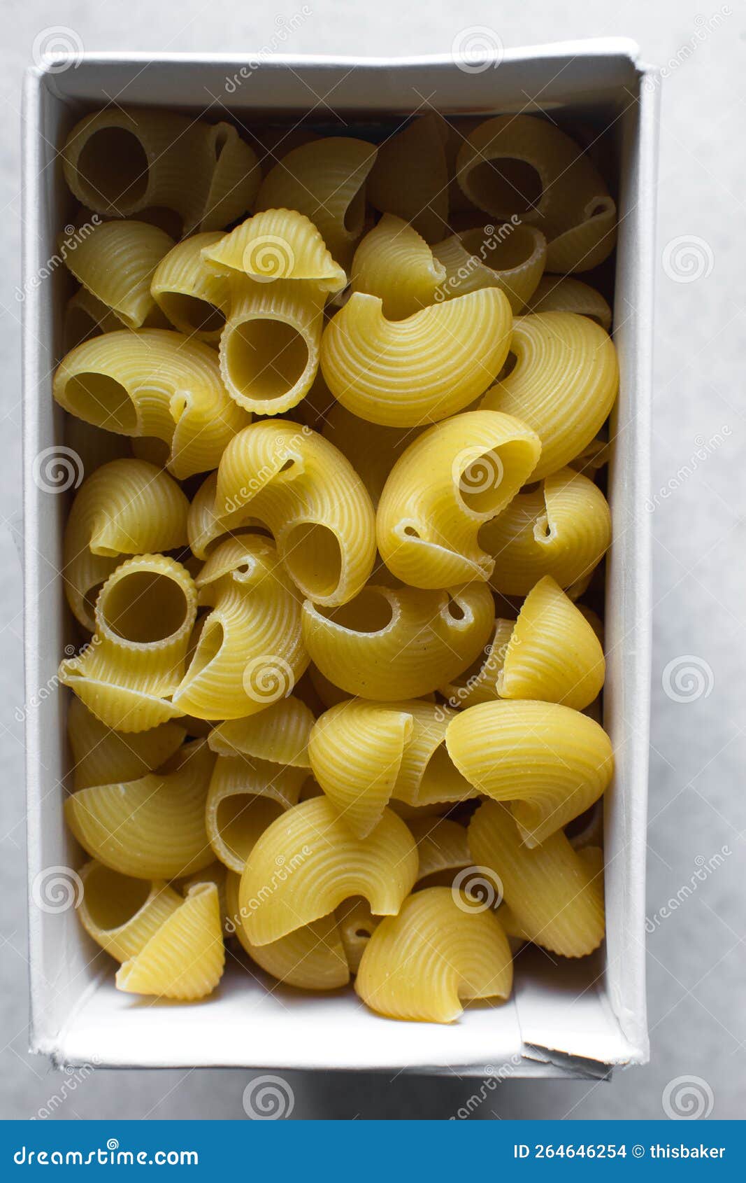 Flat Lay of Uncooked Pipe Rigate Pasta in a Box, Top View of Pipe ...