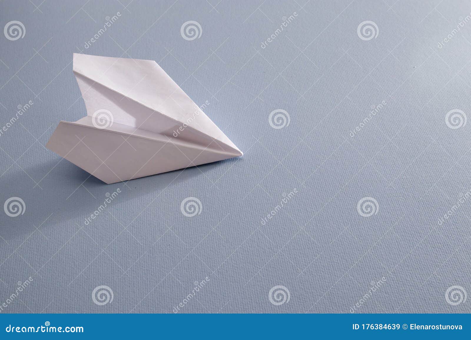 Flat Lay White Paper Plane on Blue Grey Background Stock Image - Image ...