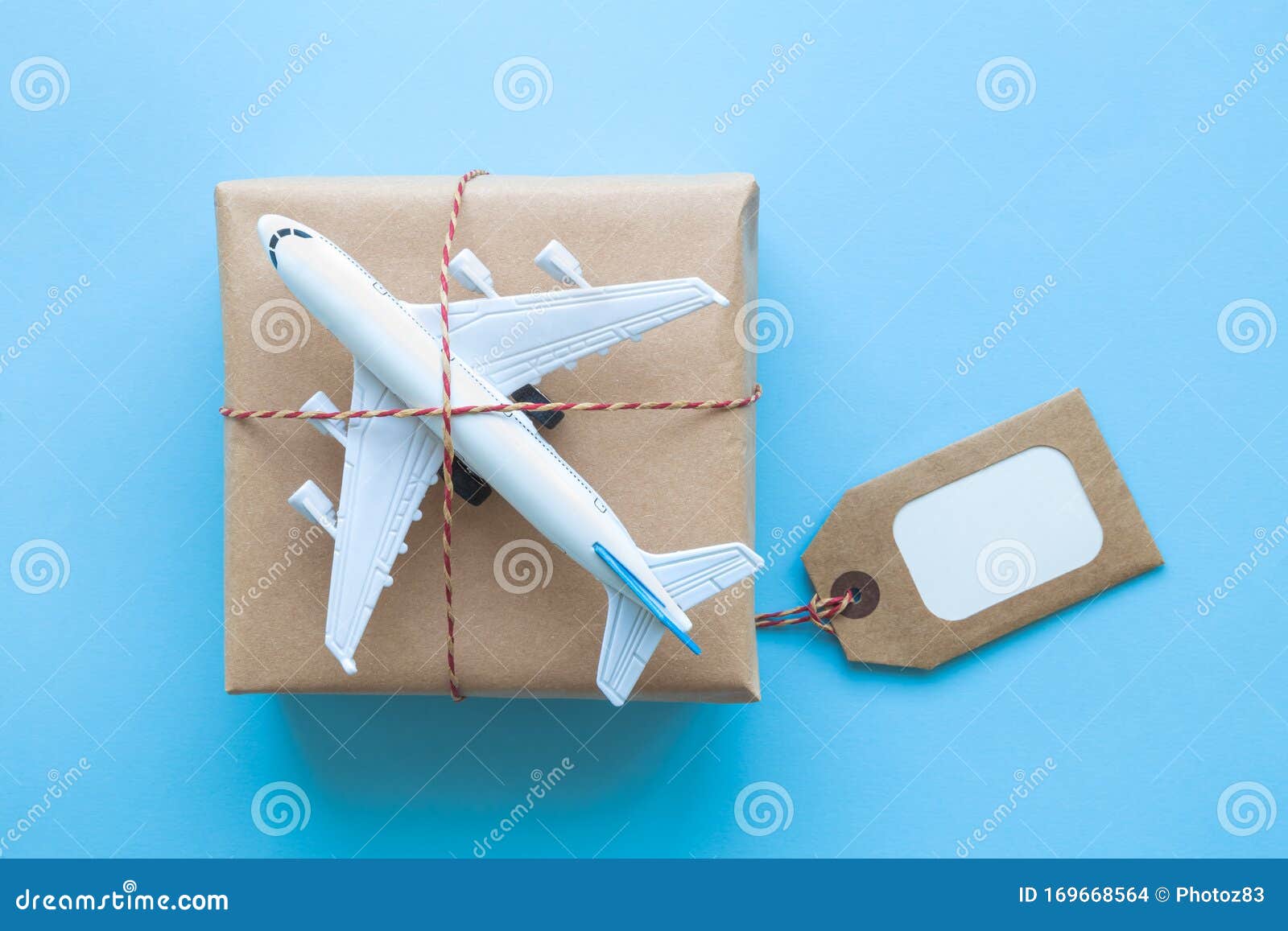 Cardboard Delivery Box with Copy Space Label and Small Airplane ...