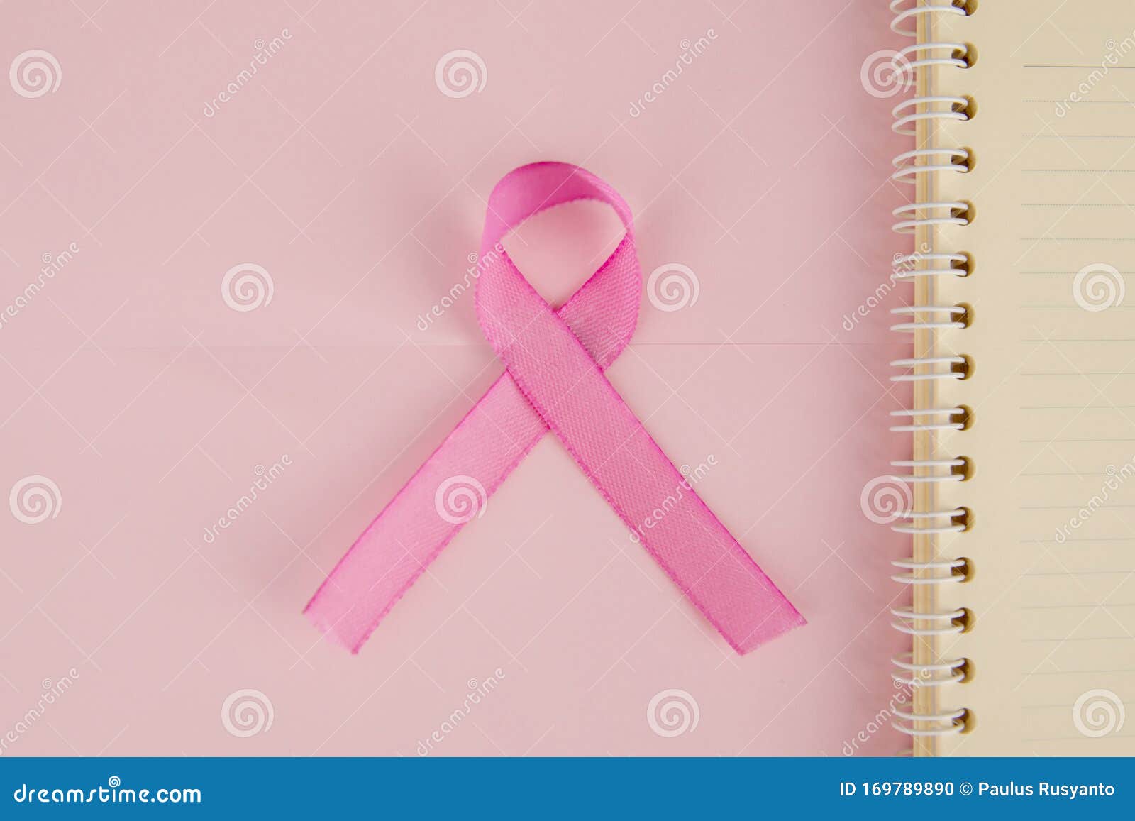 Flat Layout of Pink Ribbon beside a Notebook Stock Photo - Image of ...