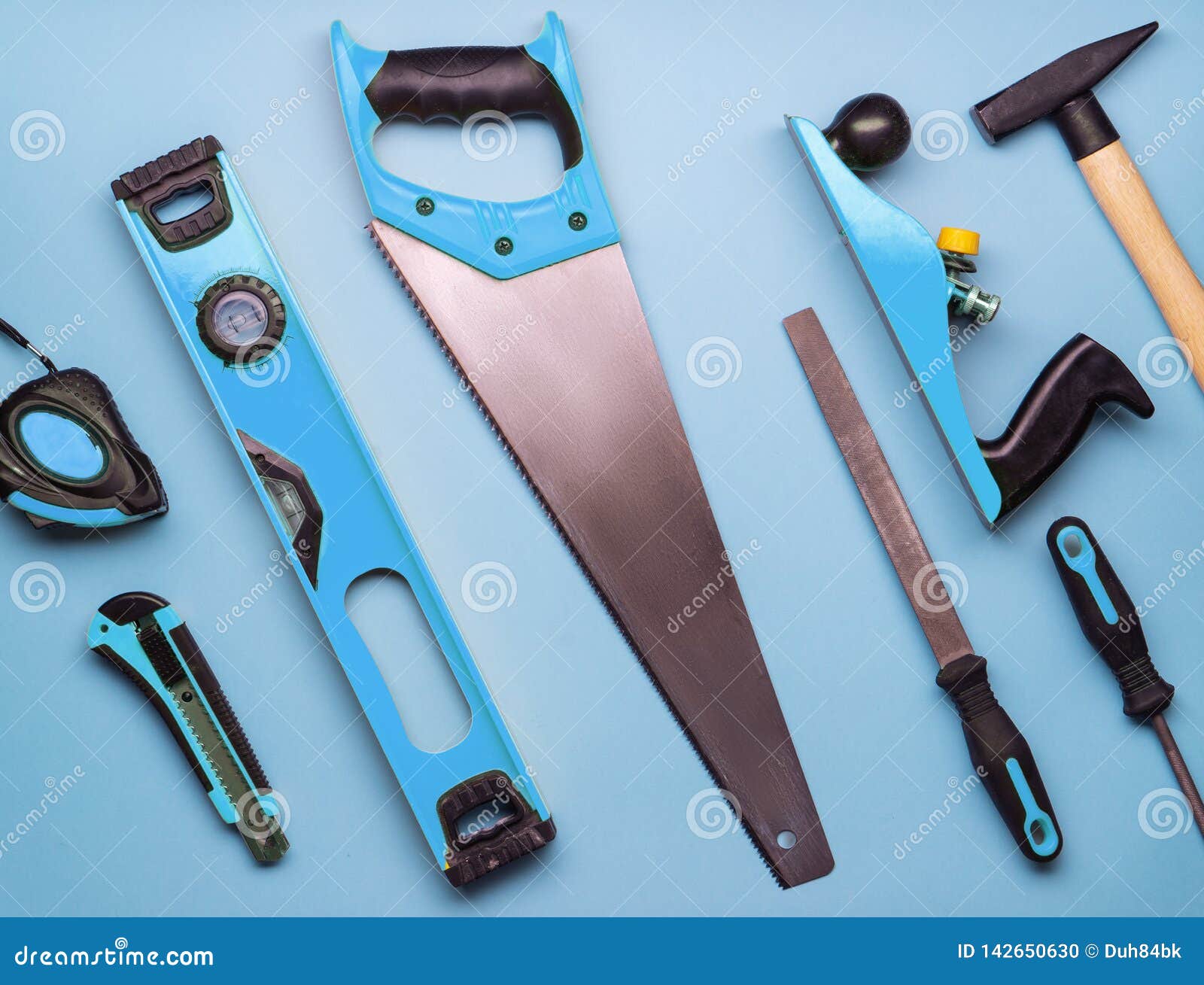 Flat Layout: a Set of Hand Tools for Construction and Repair on a Blue ...