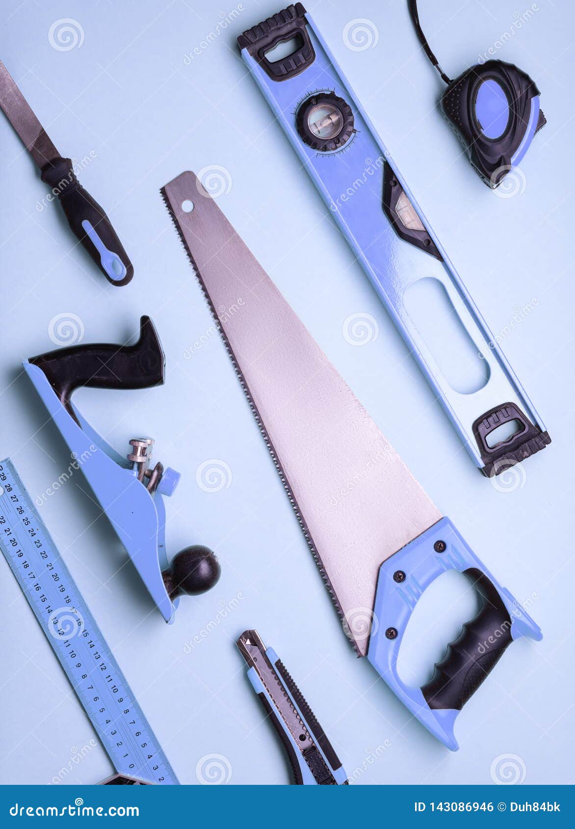 Flat Layout: a Set of Hand Tools for Construction and Repair on a Blue ...