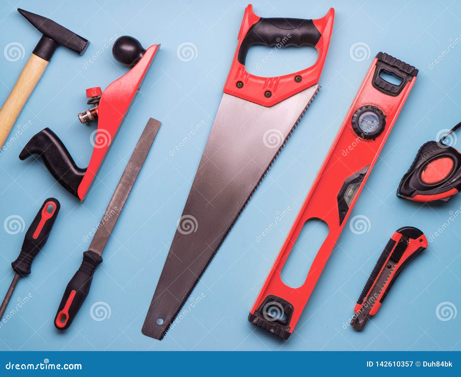 Flat Layout: a Set of Red Hand Tools for Construction and Repair on a ...