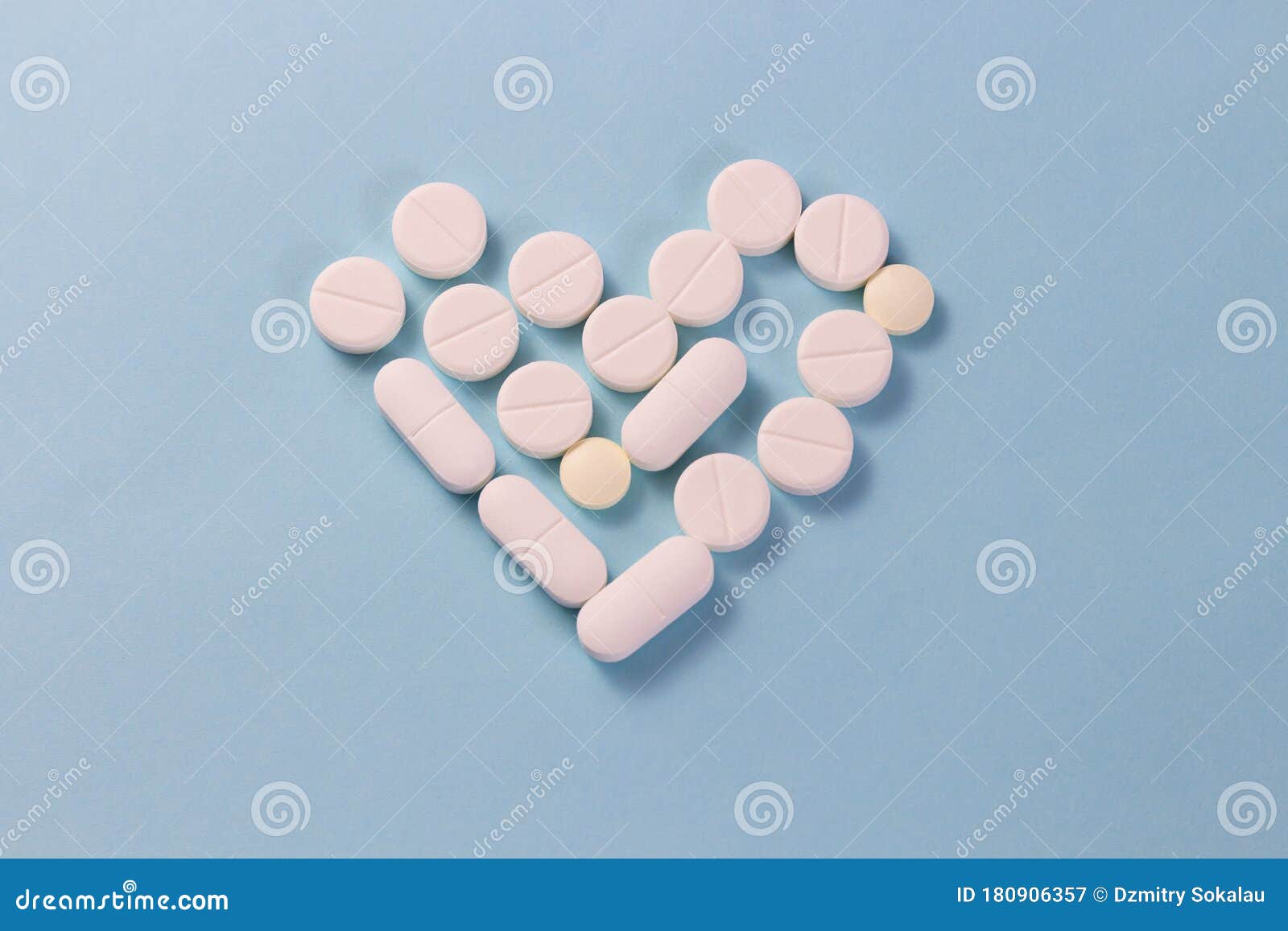 Flat Layout White Heart Shaped Pills Isolated on Blue Background Stock ...